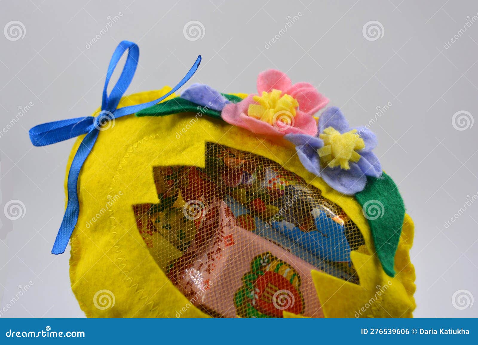 Colored Yellow Packages with Sweets Packed in the Form of an Egg Made ...