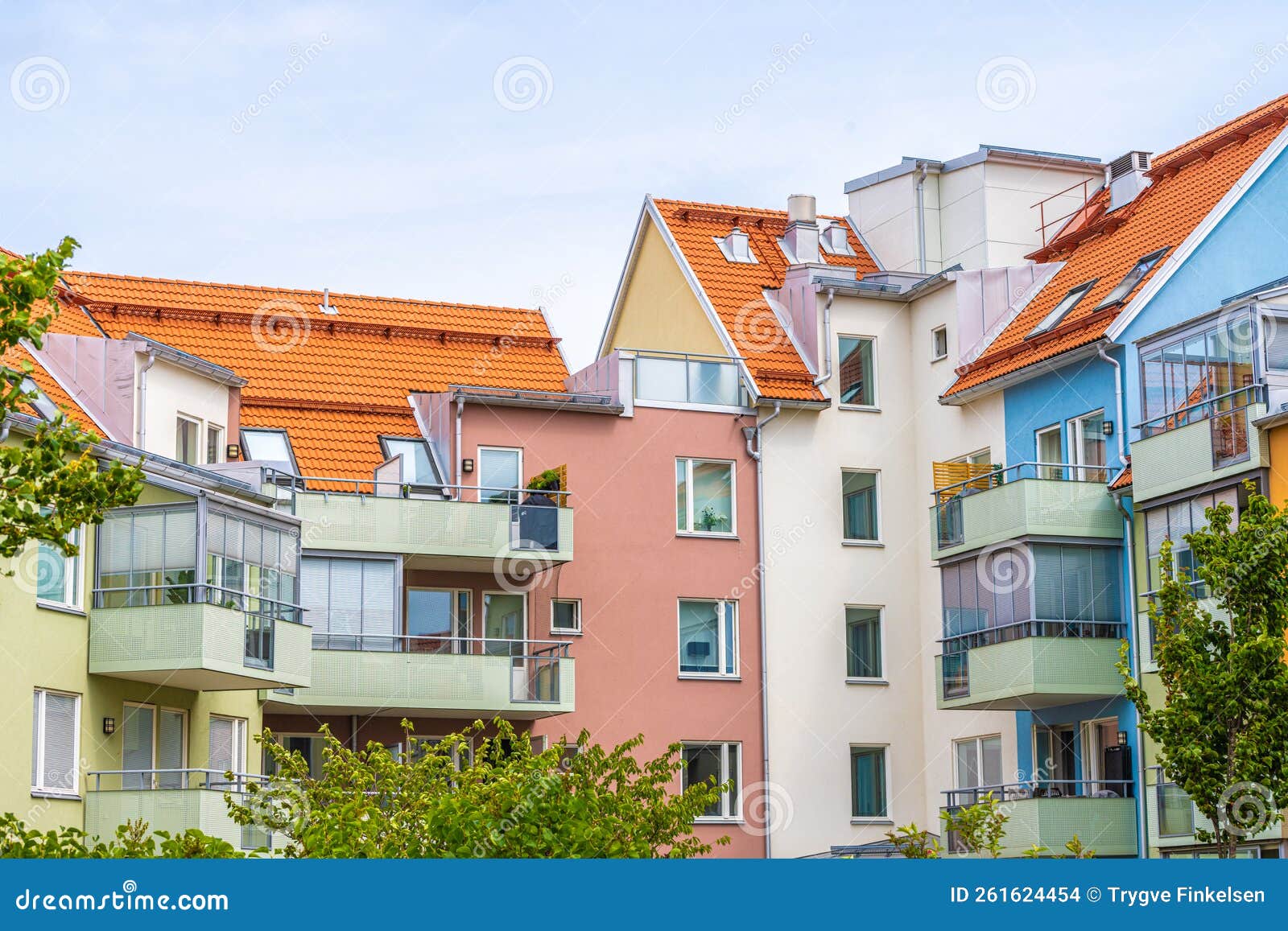 Colorful Apartment Complex Around a Small Park.. Stock Photo - Image of ...