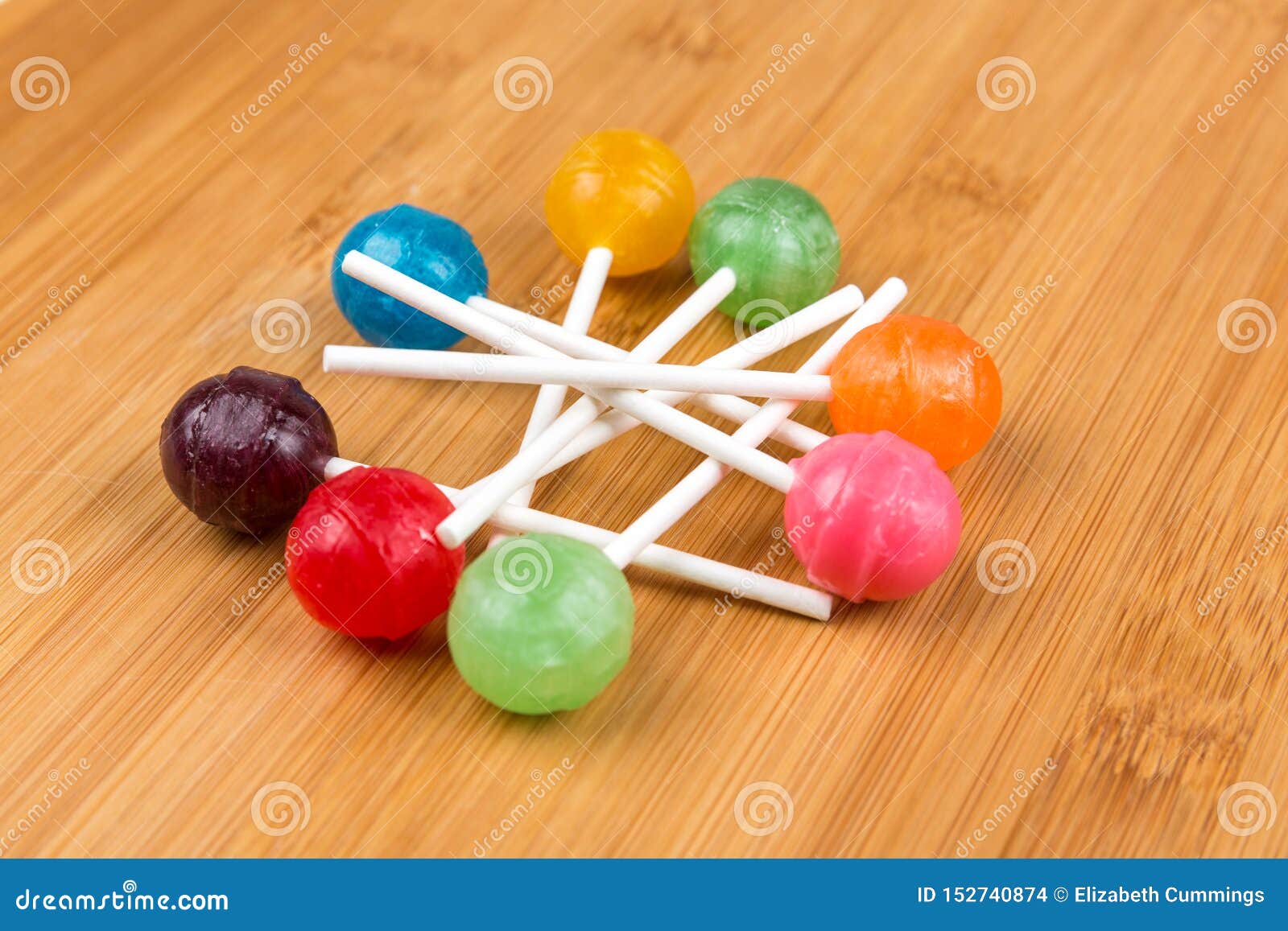 Colorful Arrangement of Candy Suckers on Sticks Stock Photo - Image of ...
