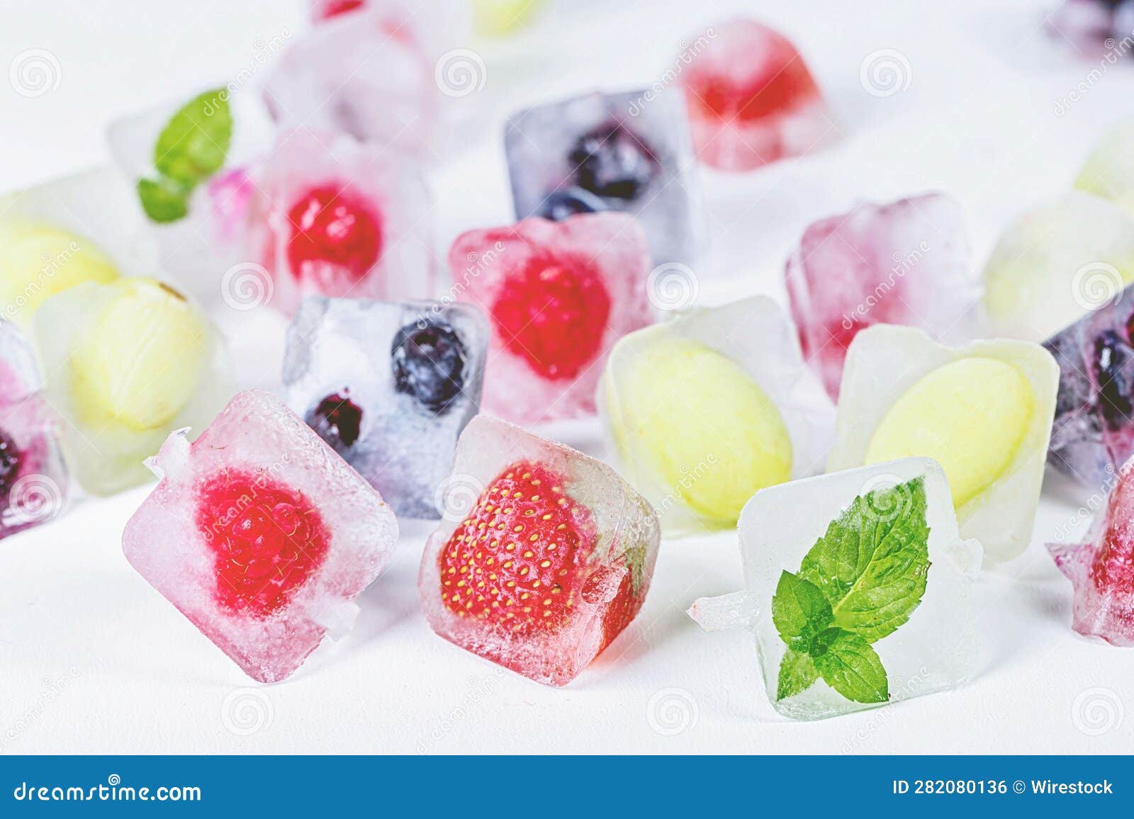 A Bunch of Different Colored Fruit Frozen in Cubes for Sale Stock Photo ...
