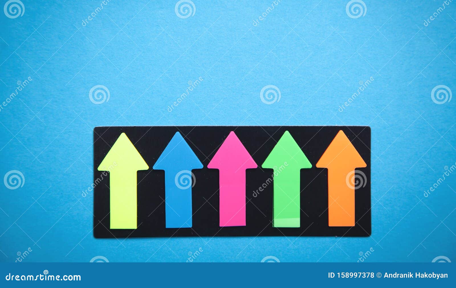 Colorful Arrows on Blue Background Stock Photo - Image of arrow ...