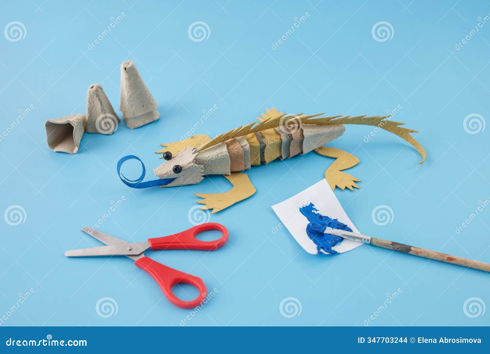 A Colorful, Artistic Representation Of A Lizard Made From Upcycled Egg ...