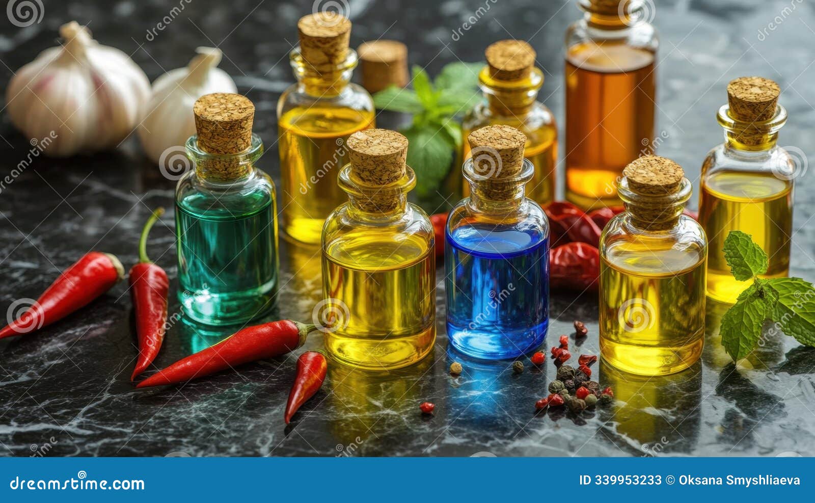 Colorful Assortment of Herbal Infused Oils with Spices on Dark Surface ...