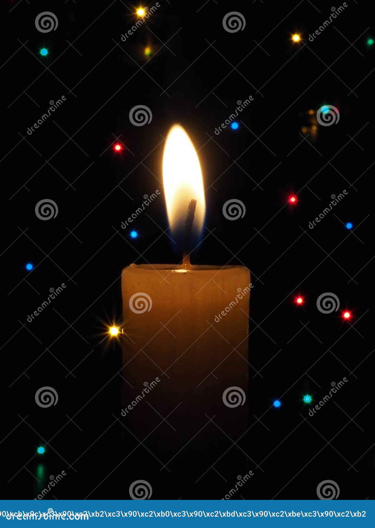Burning Candle Close-up and Multi-colored Bokeh on a Black Background ...