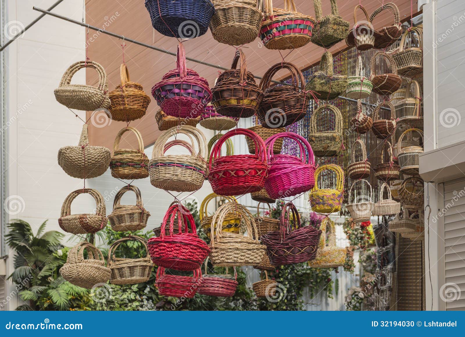 Colorful Baskets at a Flower Shop, Hanging from the Ceiling Stock Photo ...