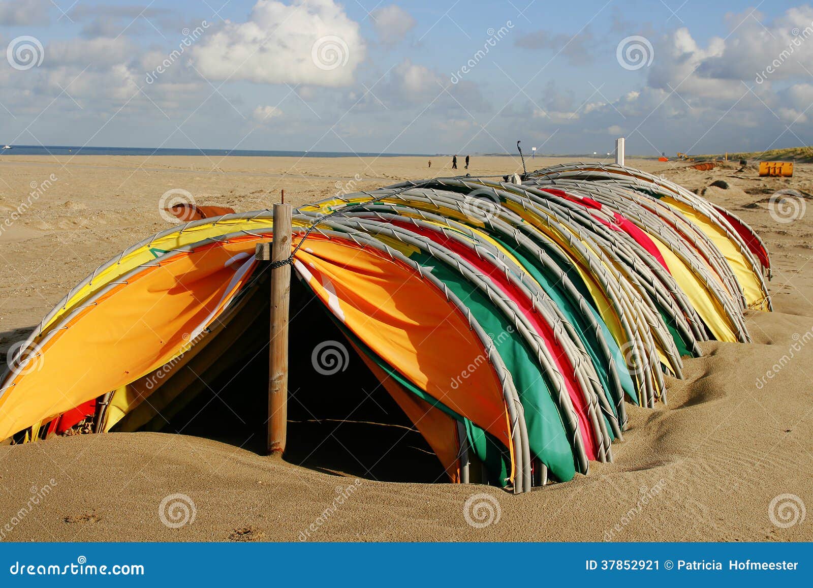 Colorful beach shelters stock image. Image of clouds - 37852921