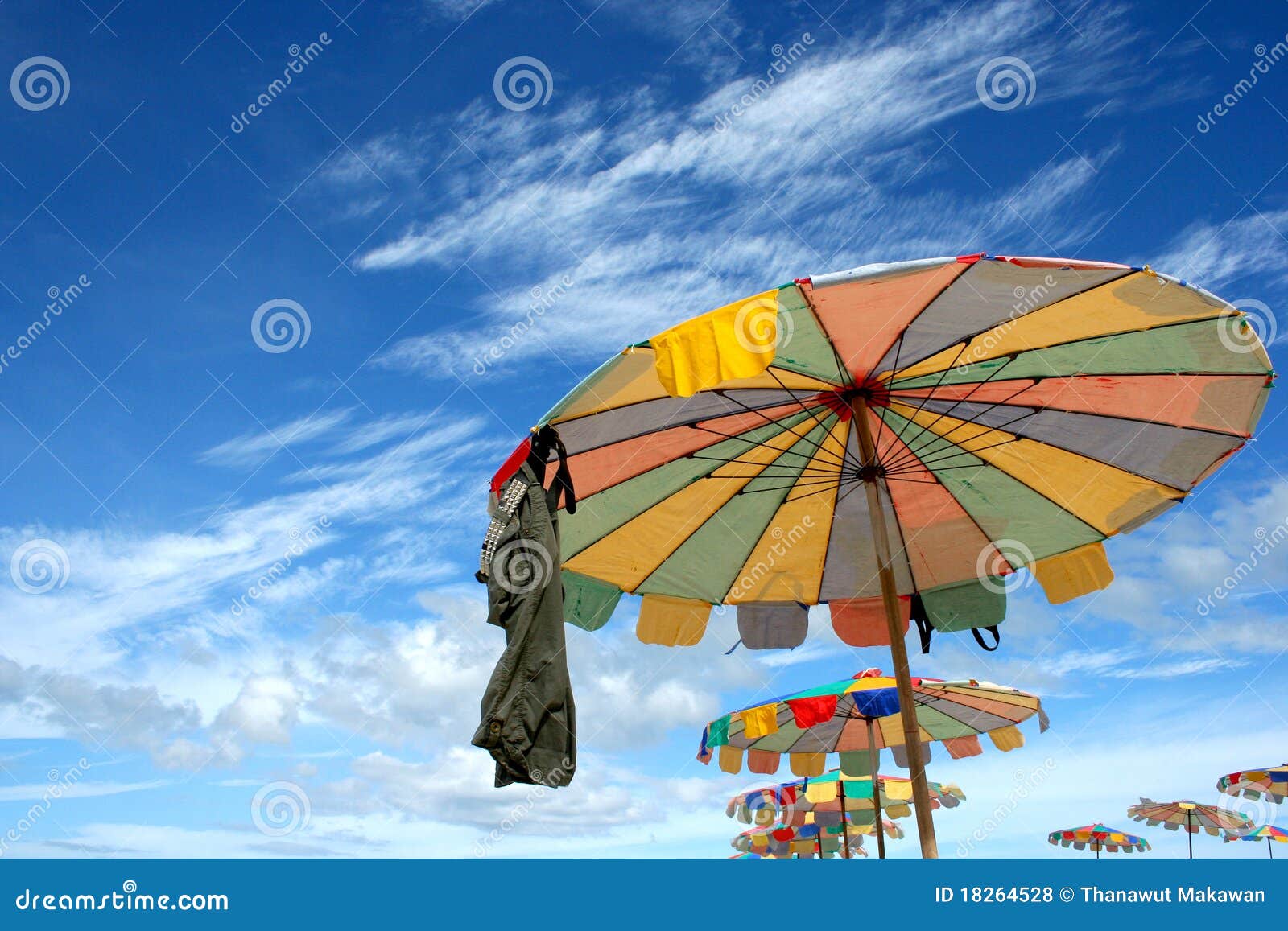 Colorful Beach Umbrella stock photo. Image of pool, sunbathing - 18264528