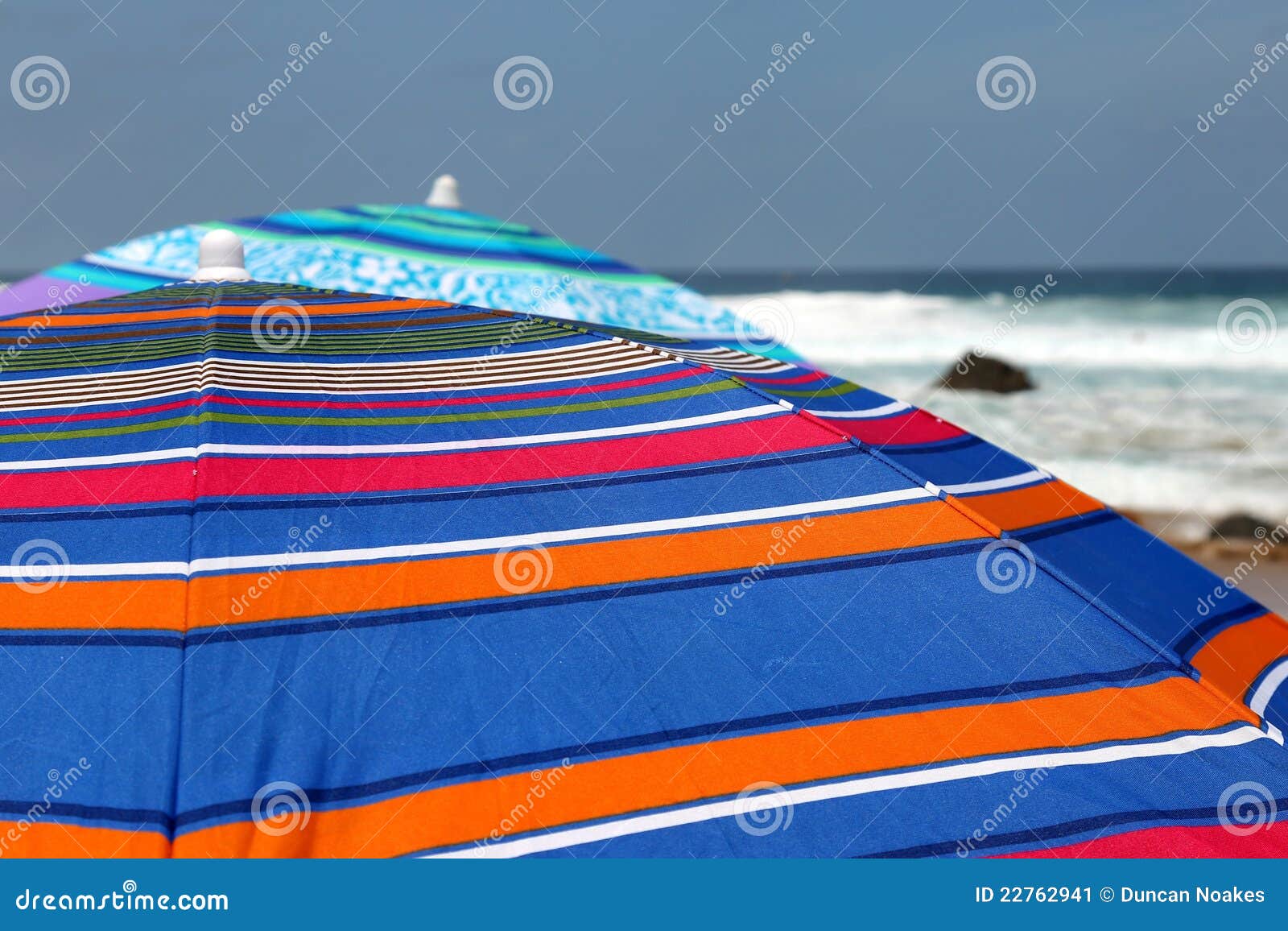 Colorful Beach Umbrellas stock image. Image of umbrella - 22762941