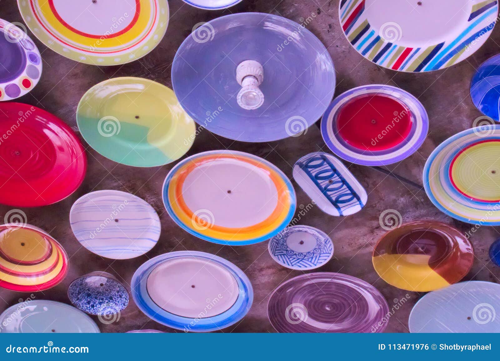 Colorful and Beautiful Array of Plates, Positioned on the Ceiling of a ...
