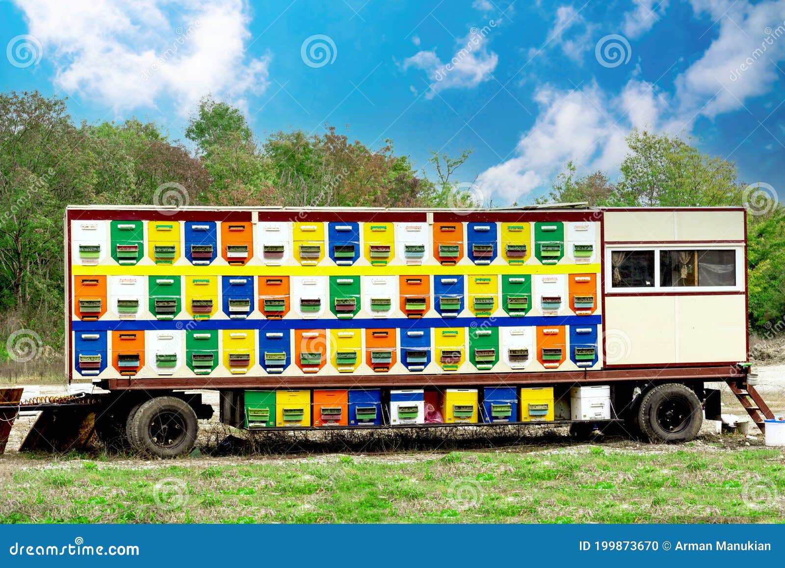Colorful Bee Hives on a Car Trailer in the Forest Stock Photo - Image ...