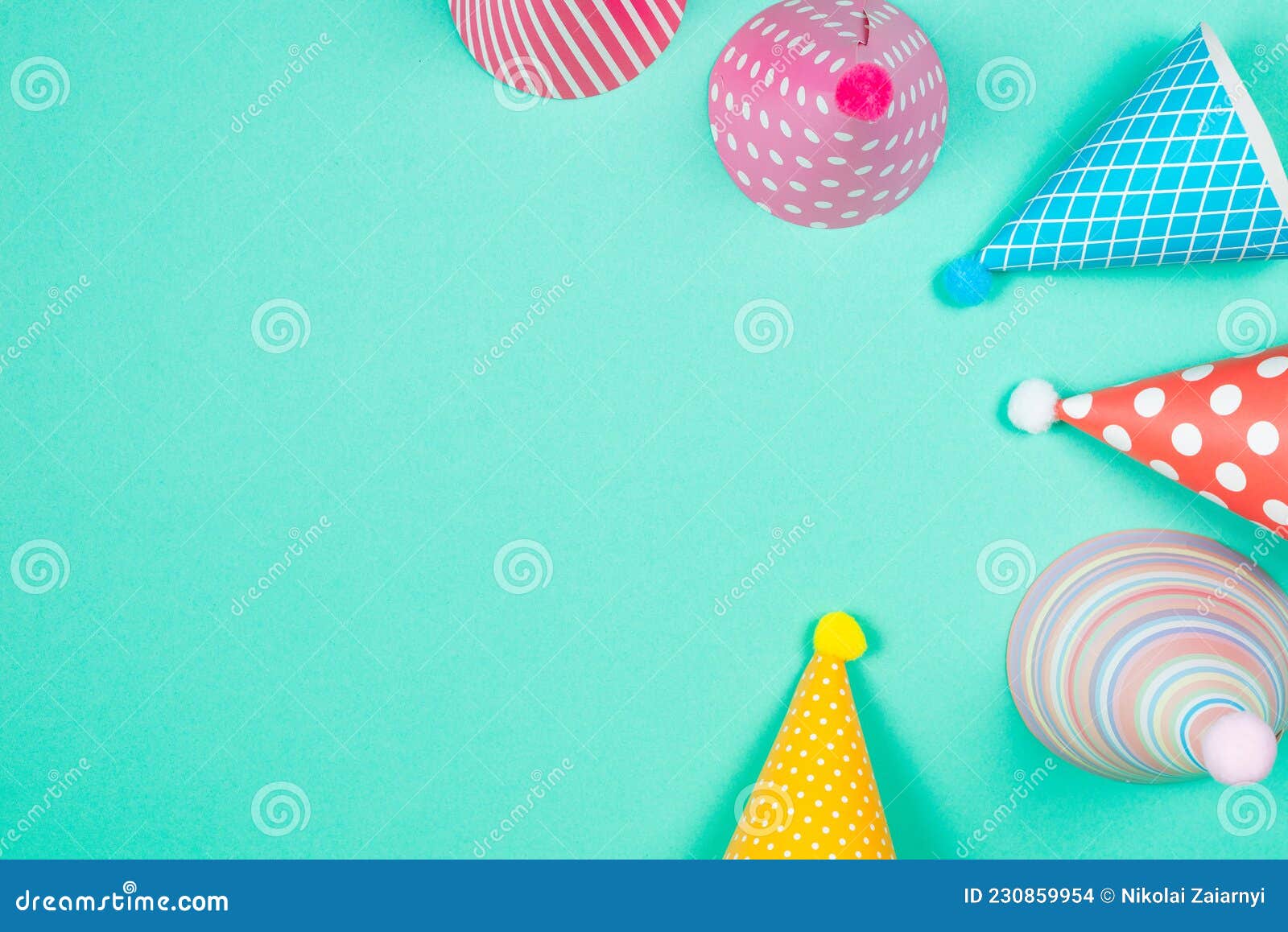 Colorful Birthday Caps on a Blue Background. Top View Stock Photo ...