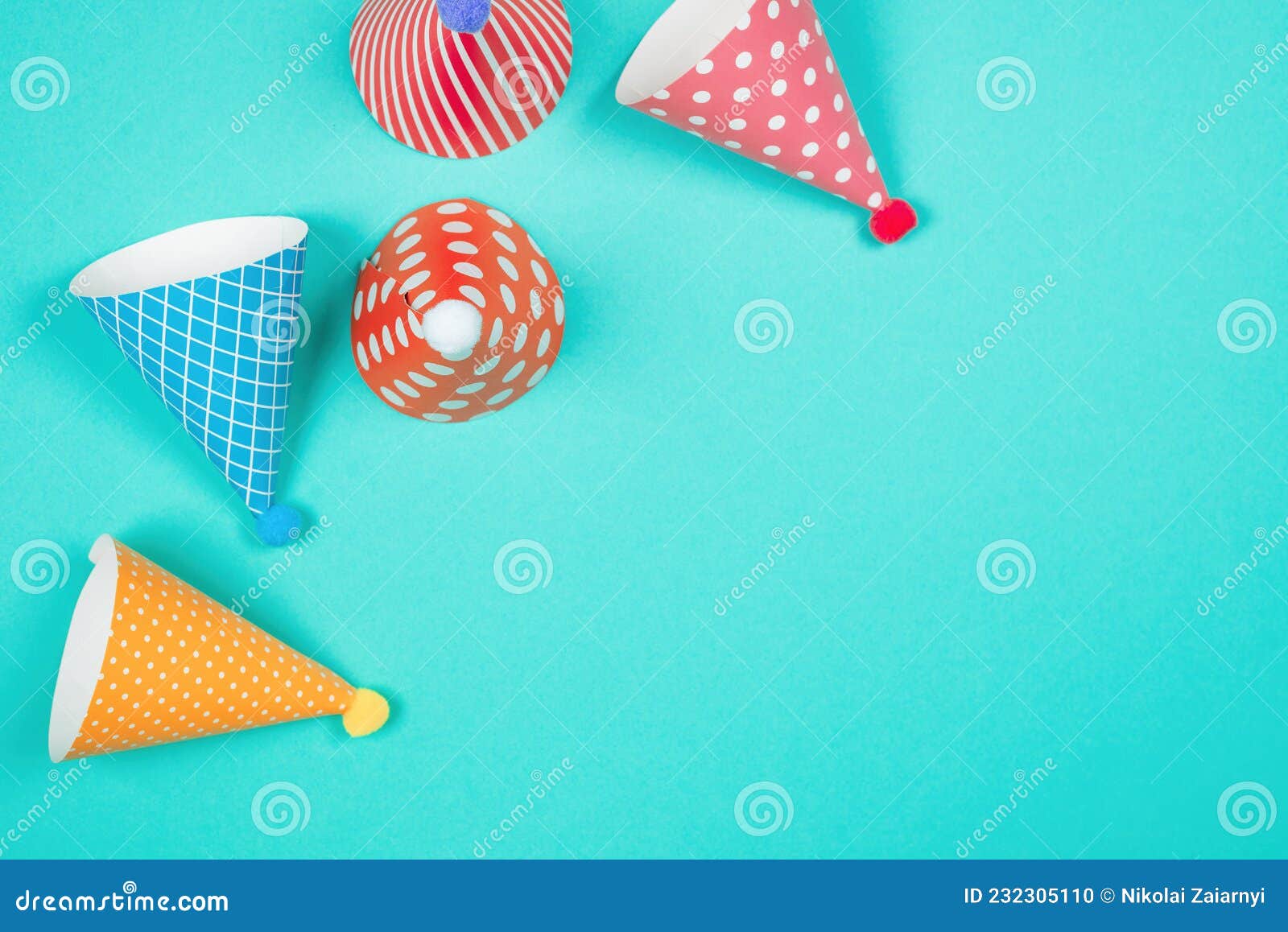 Colorful Birthday Caps on a Blue Background. Top View Stock Photo ...