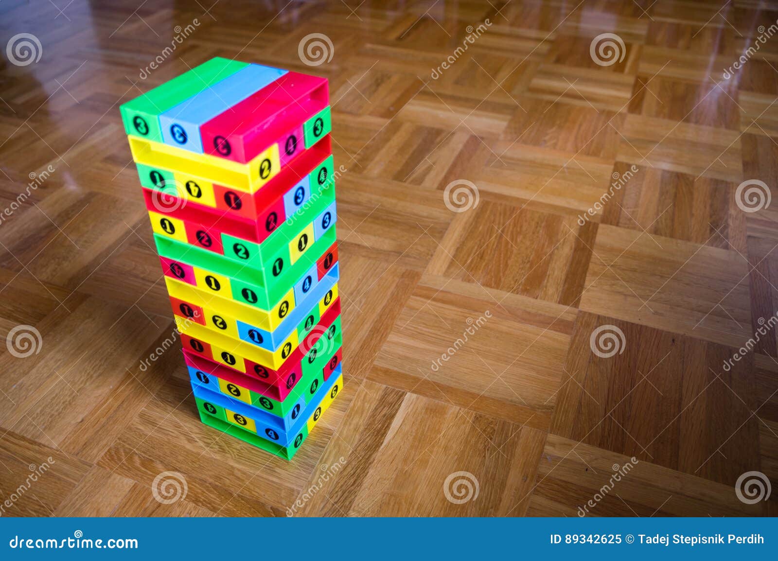 Colorful Block Game Jenga on Wooden Background Stock Image - Image of ...