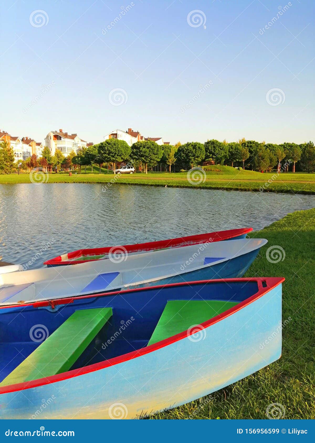 Colorful boats on the lake stock image. Image of color - 156956599