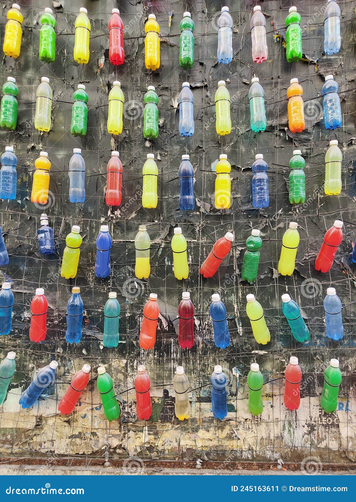 Colorful bottles wall stock image. Image of bottles - 245163611
