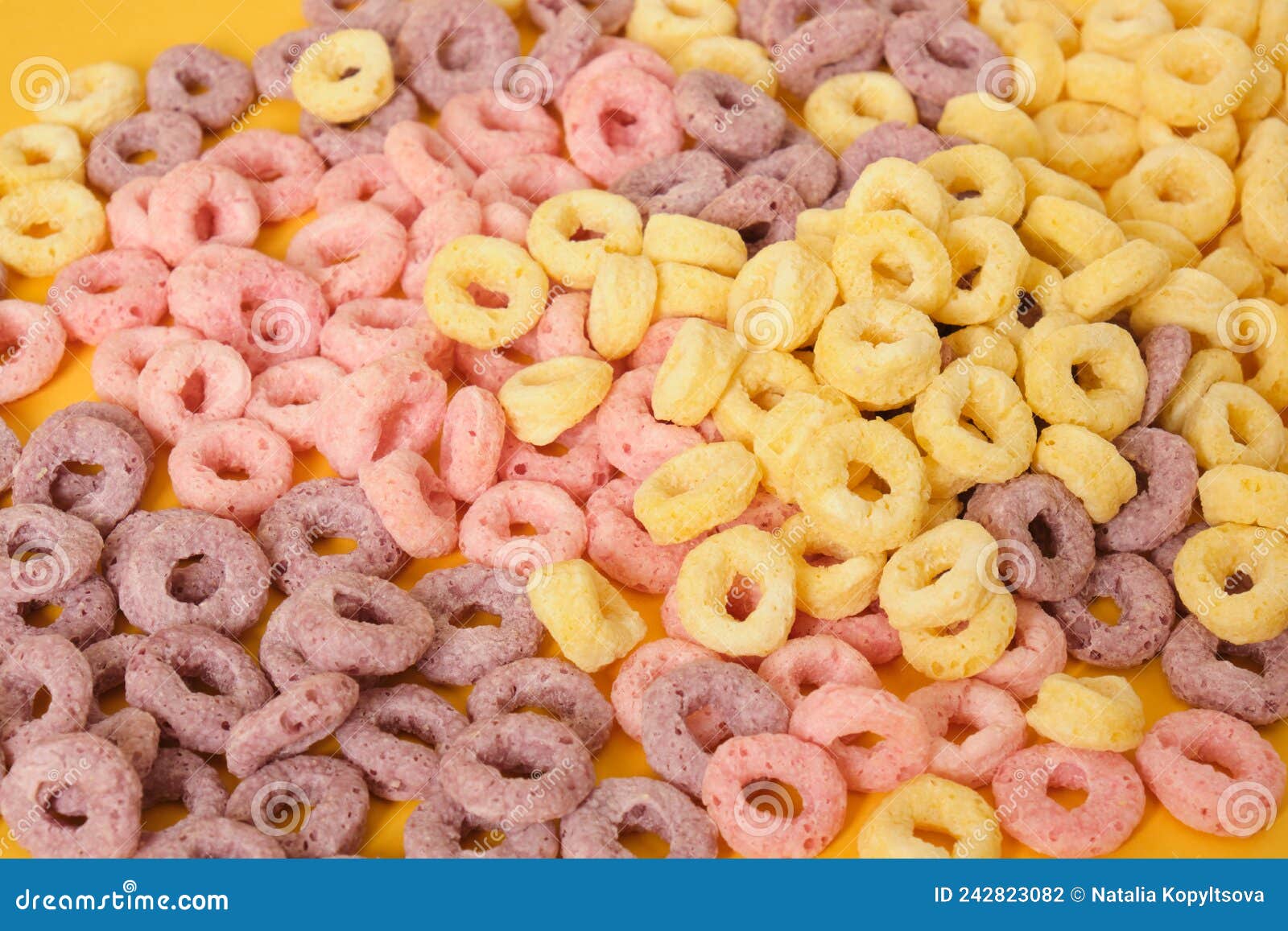 Colorful Breakfast Cereals on Yellow Background Top View Stock Photo ...