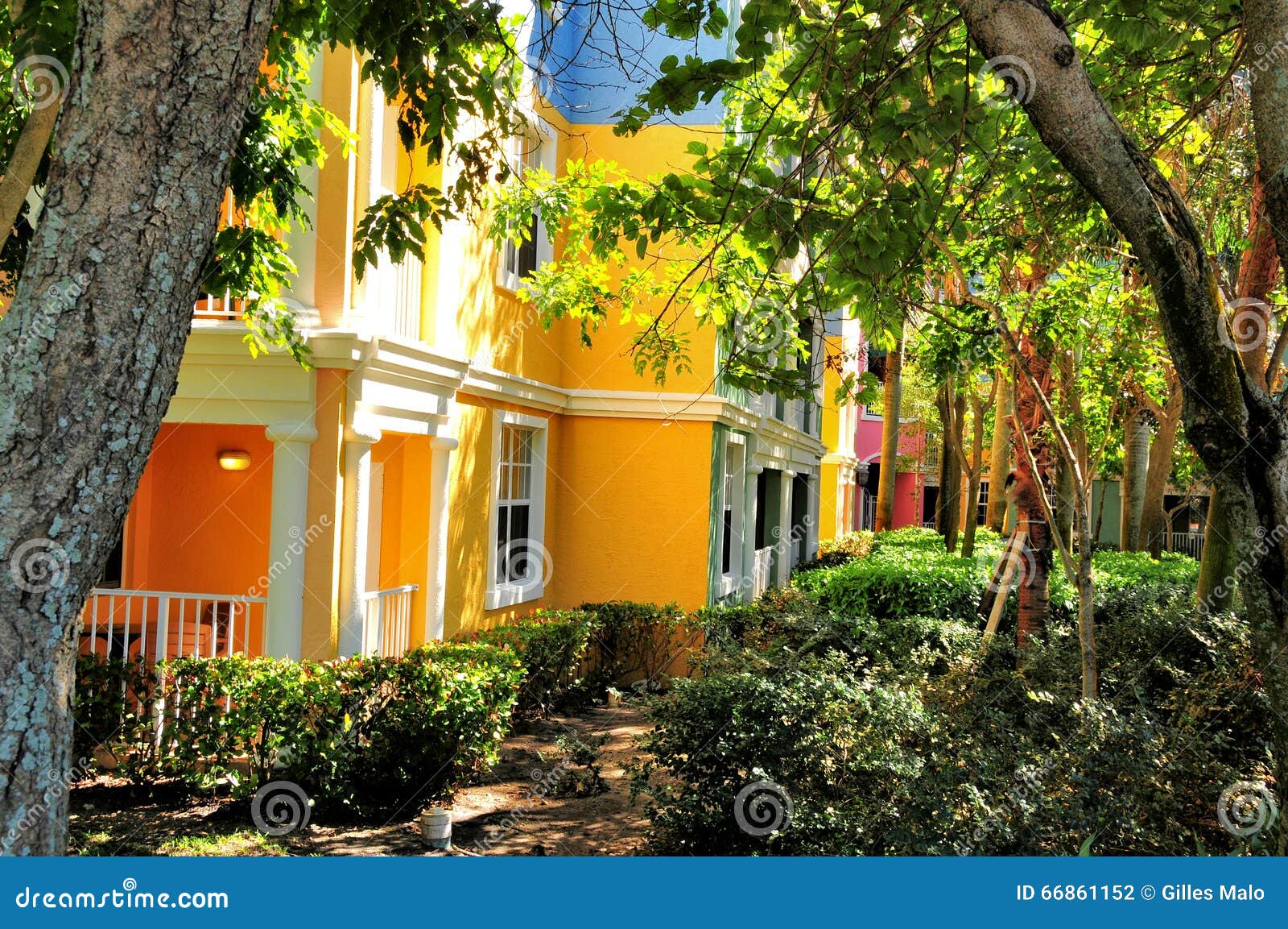 Colorful Building Community and Garden Stock Photo - Image of ...