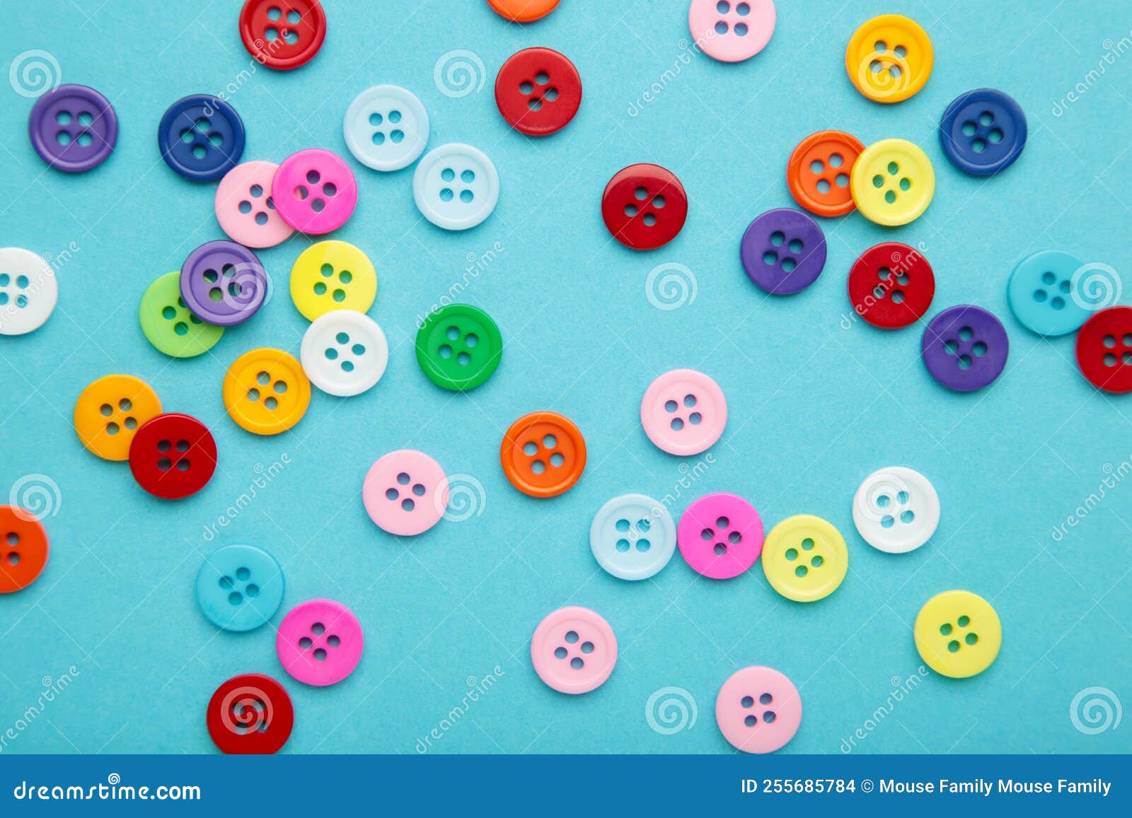 Colorful Button Assortment on a Blue Background Stock Photo - Image of ...