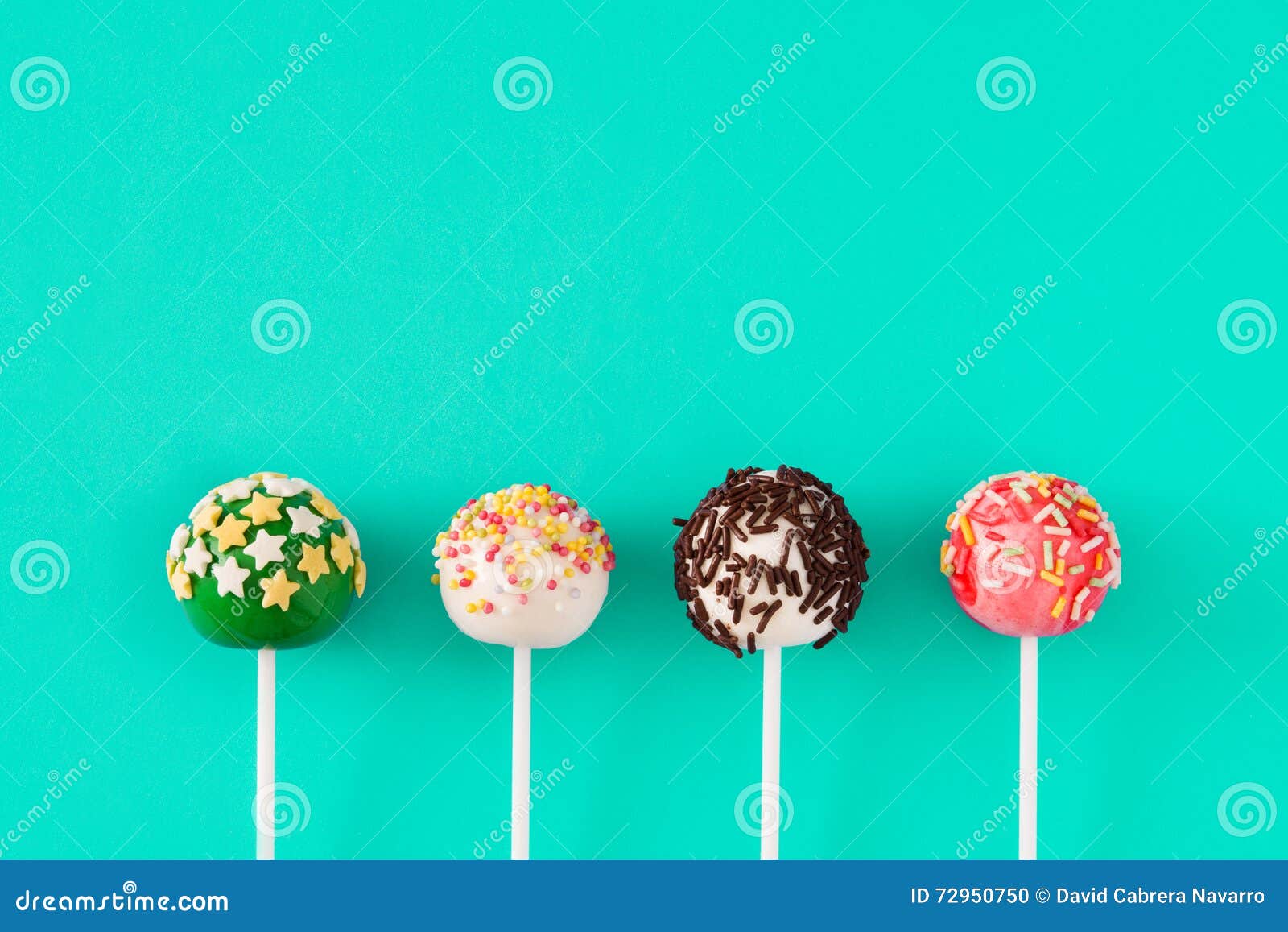 Colorful Cake Pops on Blue Background Stock Photo - Image of food ...