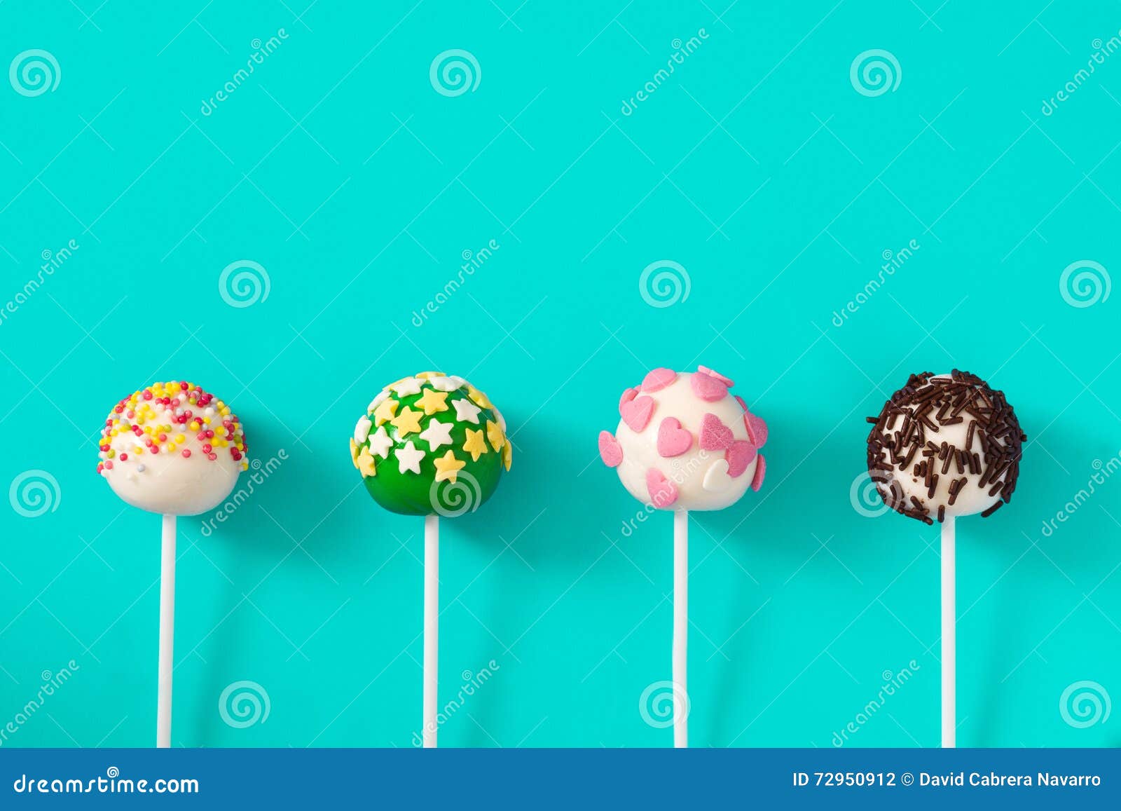 Colorful Cake Pops on Blue Background Stock Photo - Image of ball ...