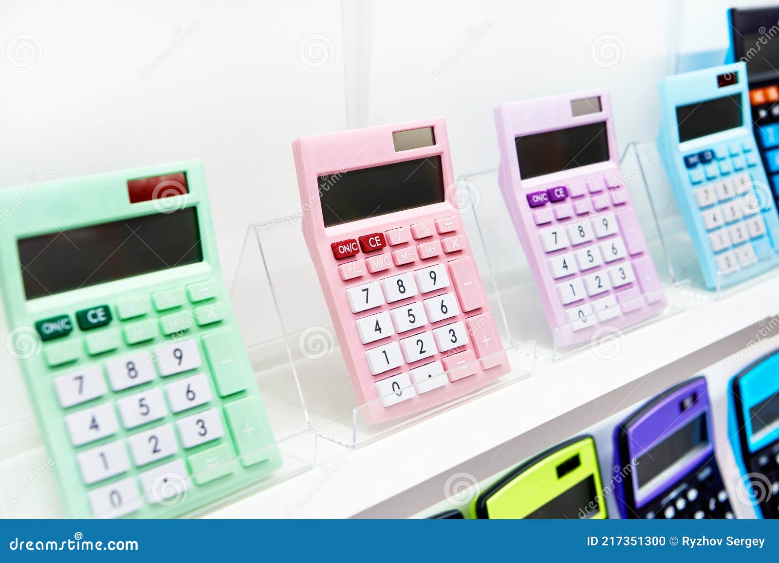 Colorful Calculators on Showcase in Stationery Store Stock Photo ...