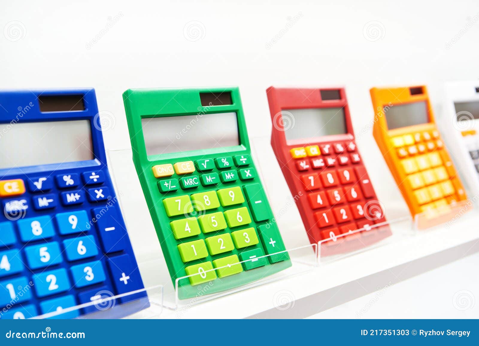 Colorful Calculators on Showcase in Stationery Store Stock Image ...