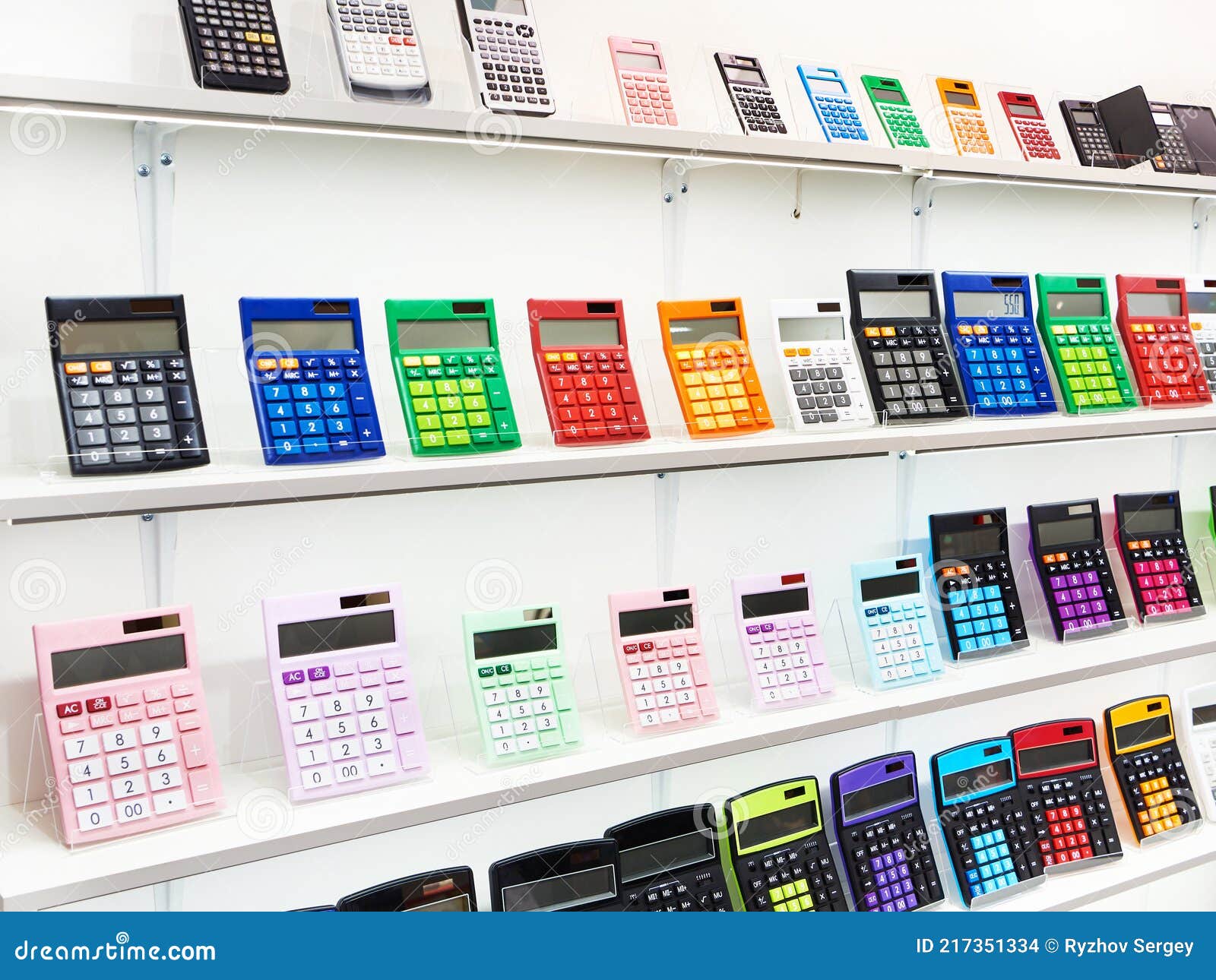 Colorful Calculators on Showcase in Stationery Store Stock Photo ...