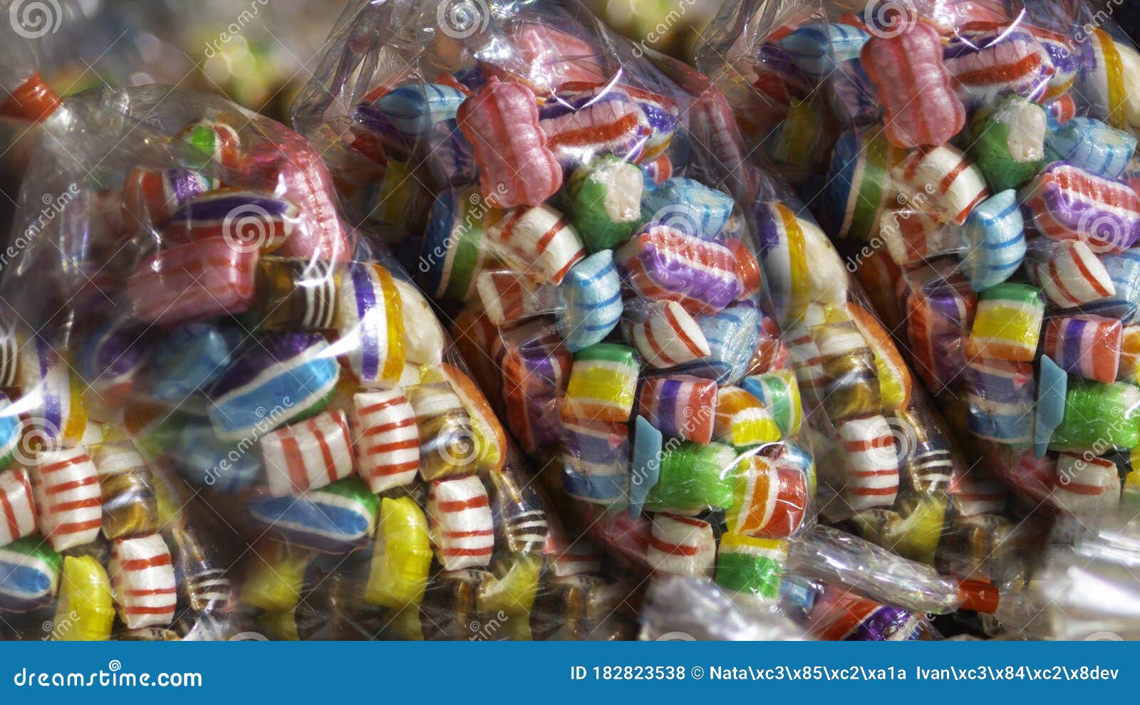 Colorful Candies in Plastic Packaging Stock Photo - Image of nuts ...