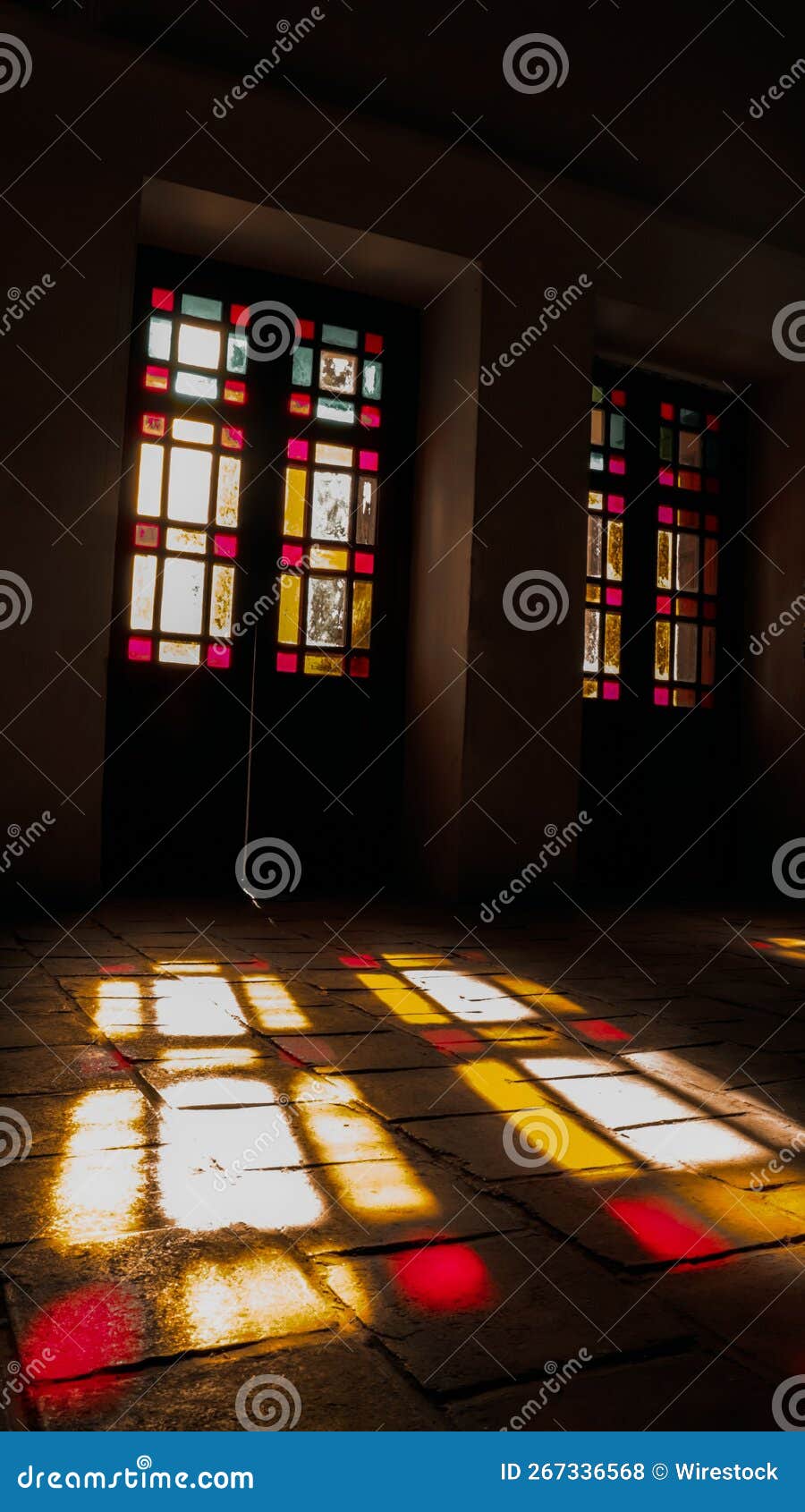 Colorful Capiz Shell Windows Reflected in the Floor of a Baroque-style ...