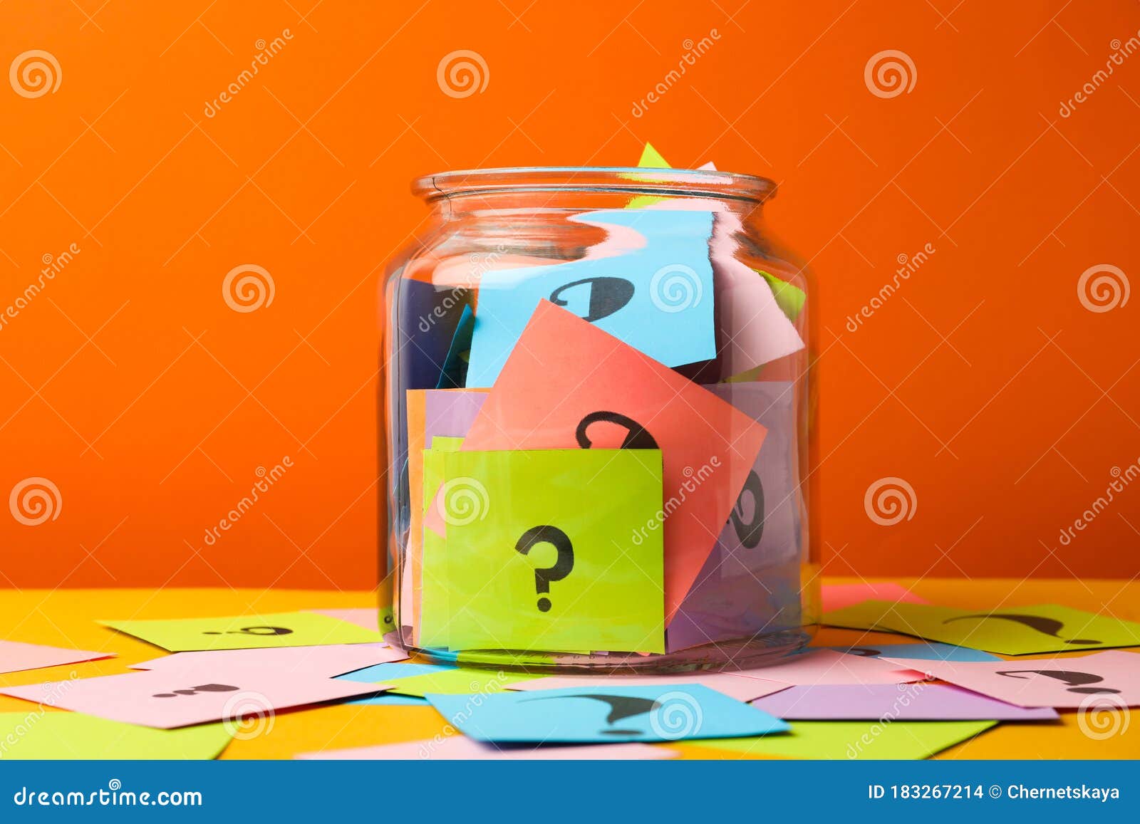 Colorful Cards with Question Marks in Glass Jar on Background Stock ...