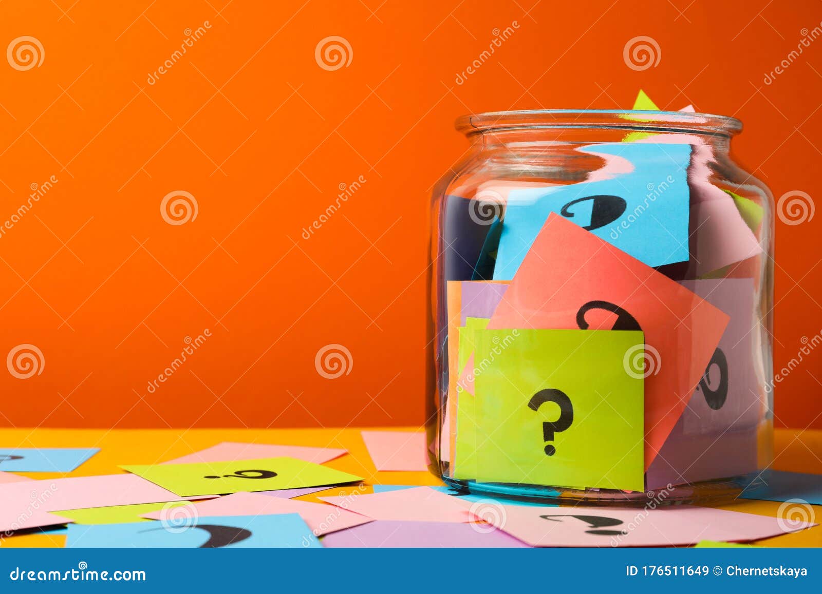 Colorful Cards with Question Marks in Glass Jar on Background. Space ...