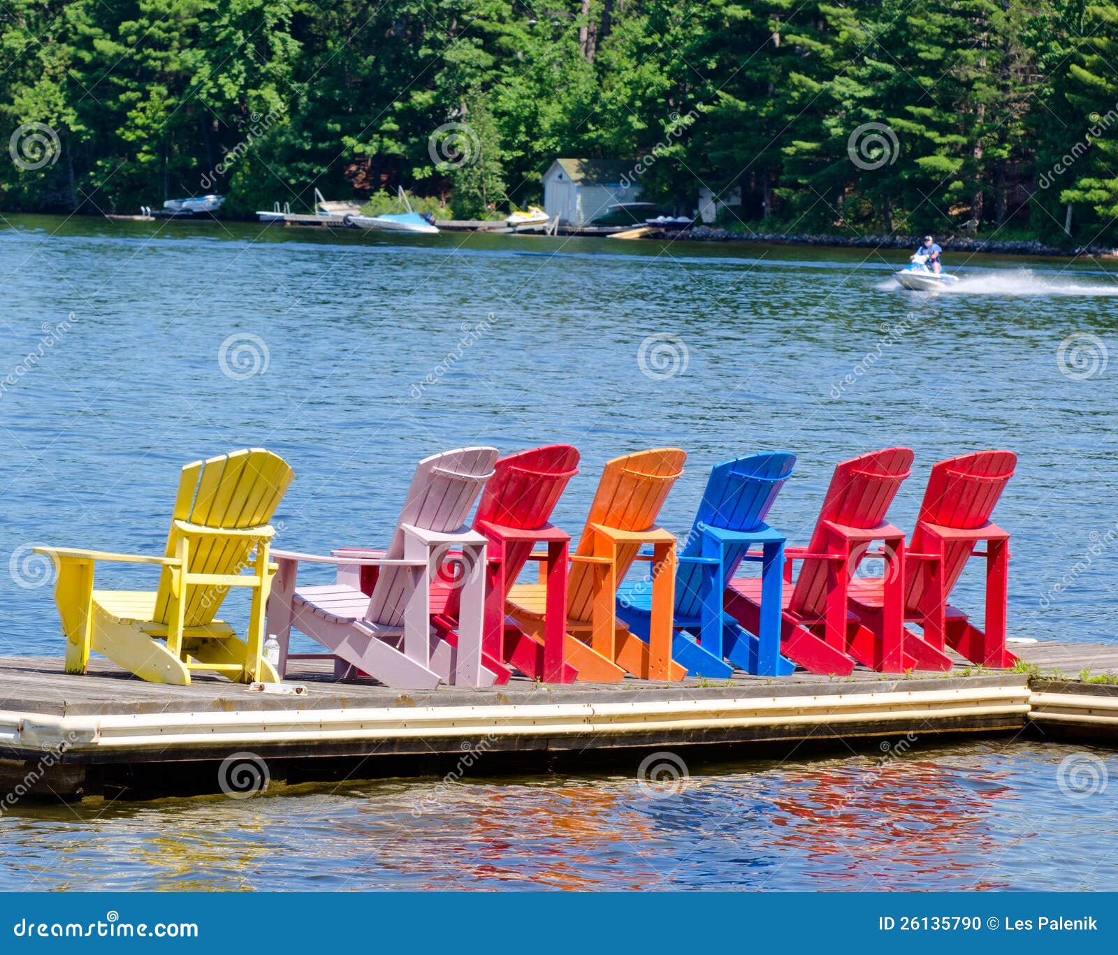 Colorful chairs on a dock stock photo. Image of wave - 26135790
