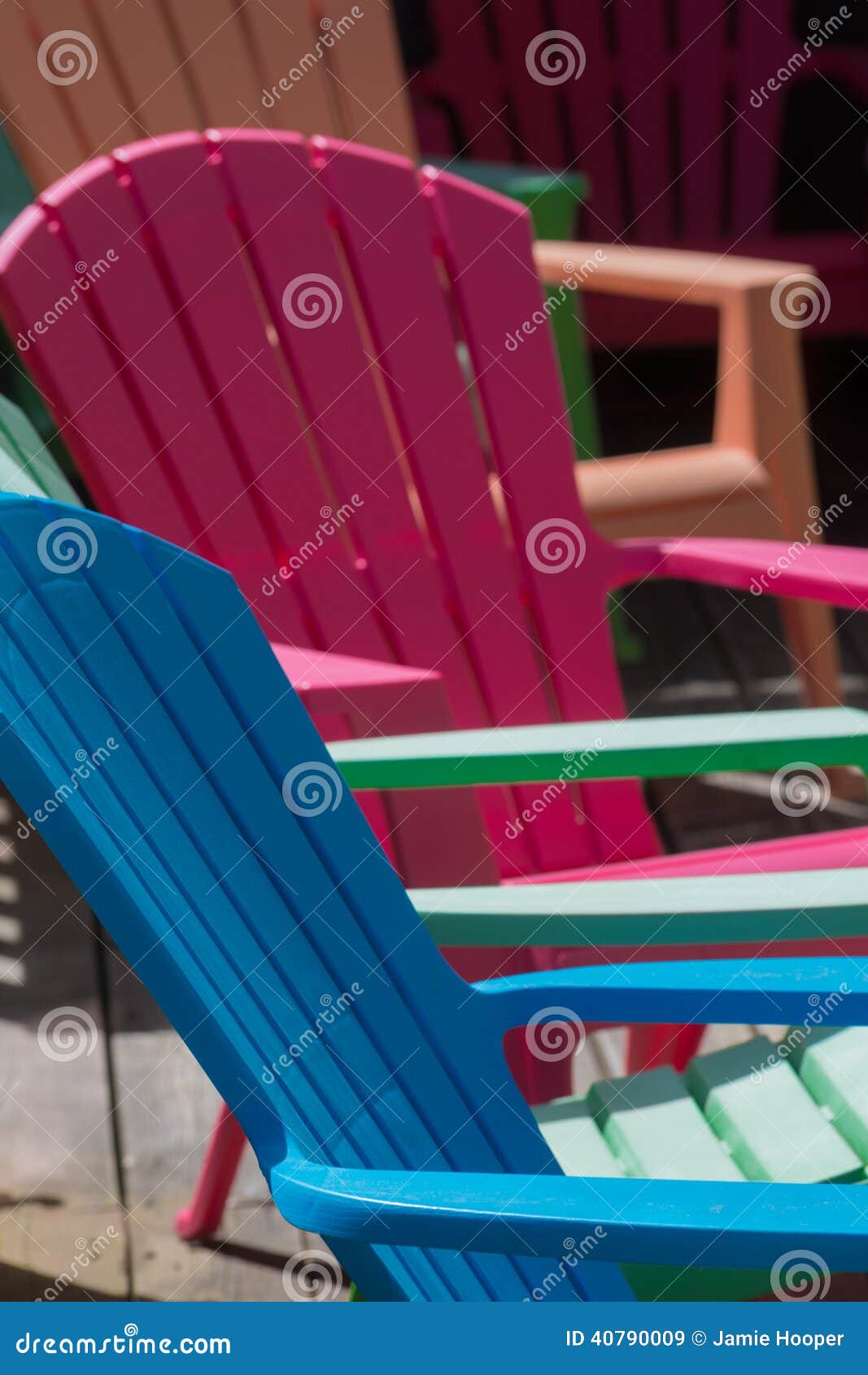 Colorful Chairs stock image. Image of wood, orange, green - 40790009