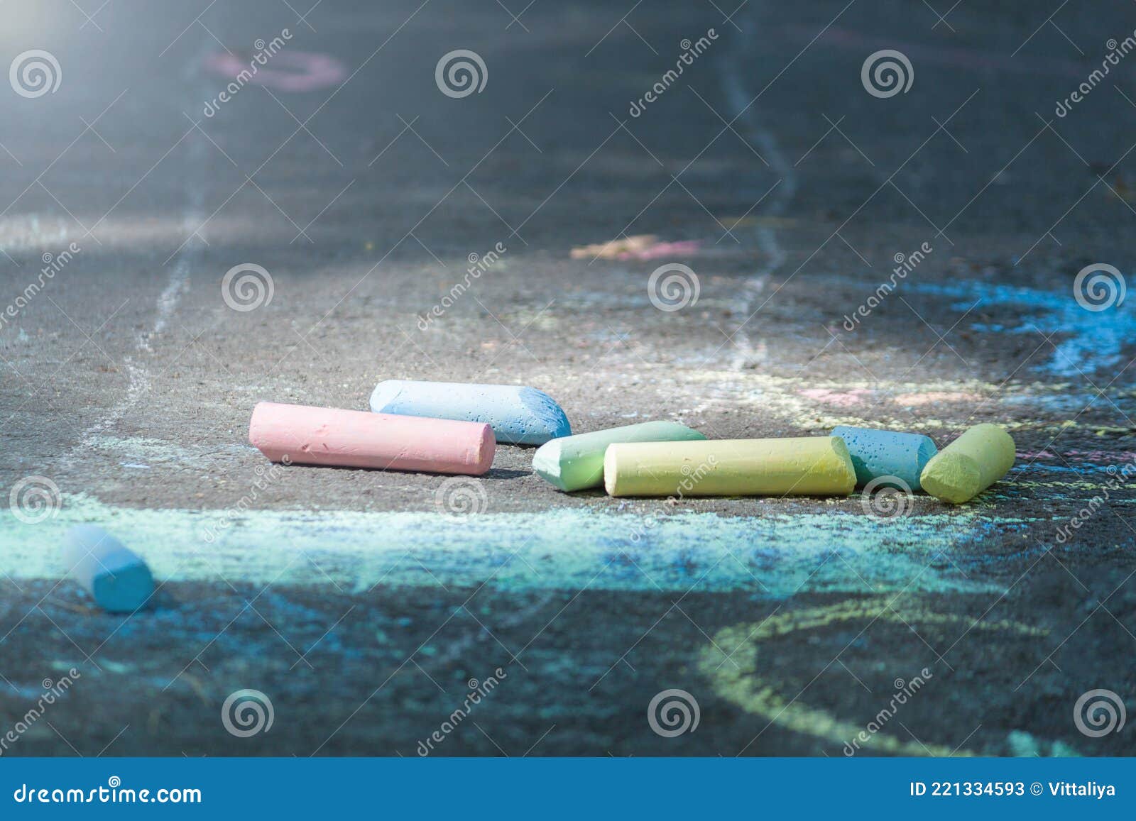 Colorful Chalk on the Asphalt. Drawing with Chalk on the Pavement Stock ...