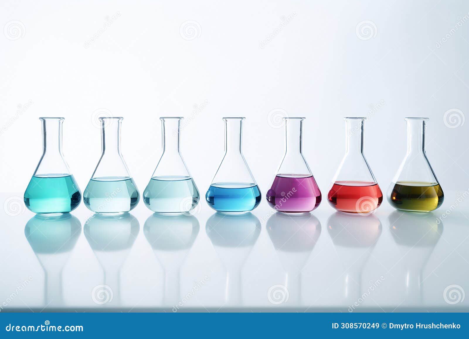 Colorful Chemicals in Lab Flasks on a White Table. Scientific ...