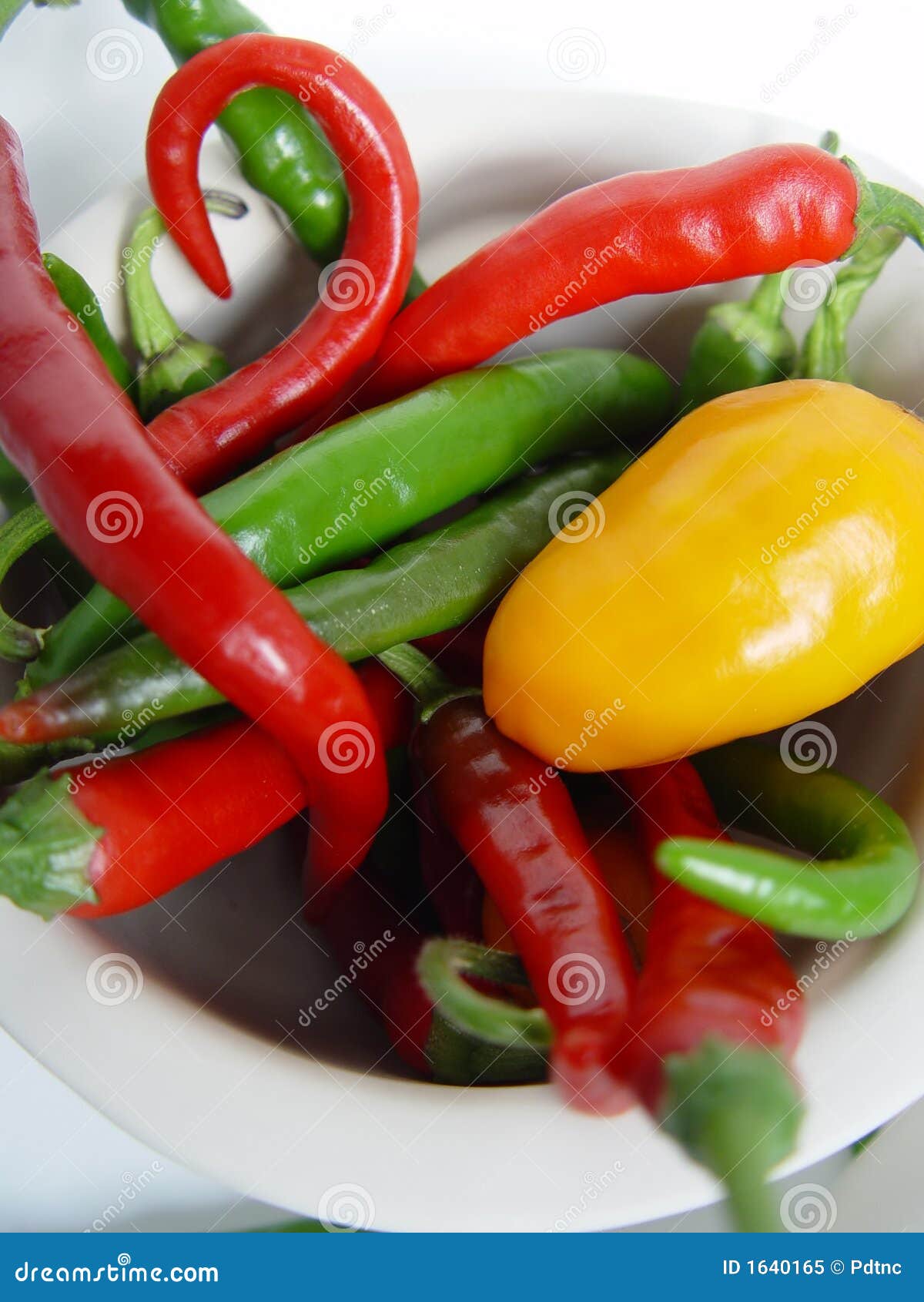 Colorful chili peppers stock image. Image of colors, white - 1640165