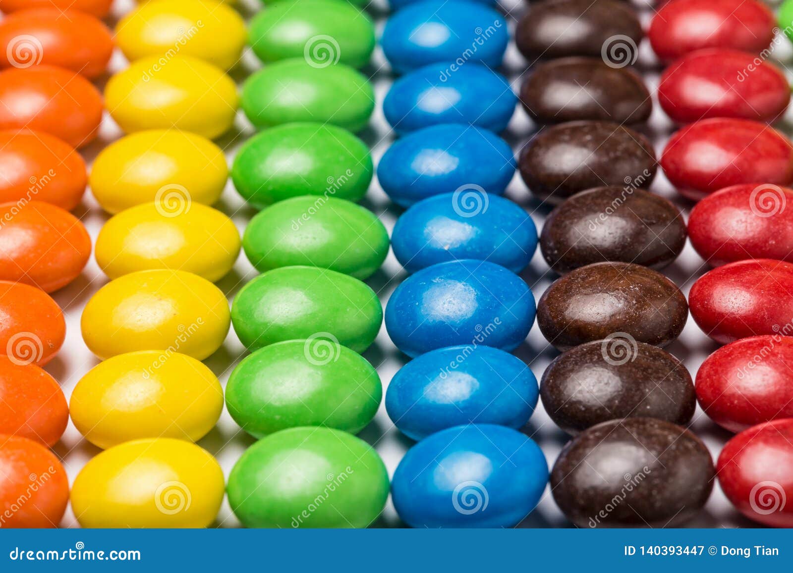 Colorful chocolate beans stock image. Image of brown - 140393447
