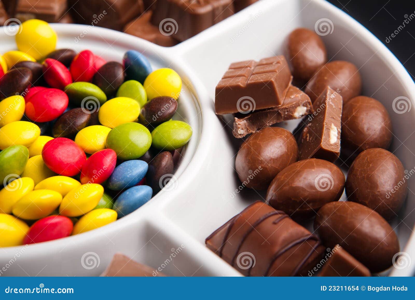 Colorful Chocolate Sweets with Pieces of Chocolate Stock Photo - Image ...