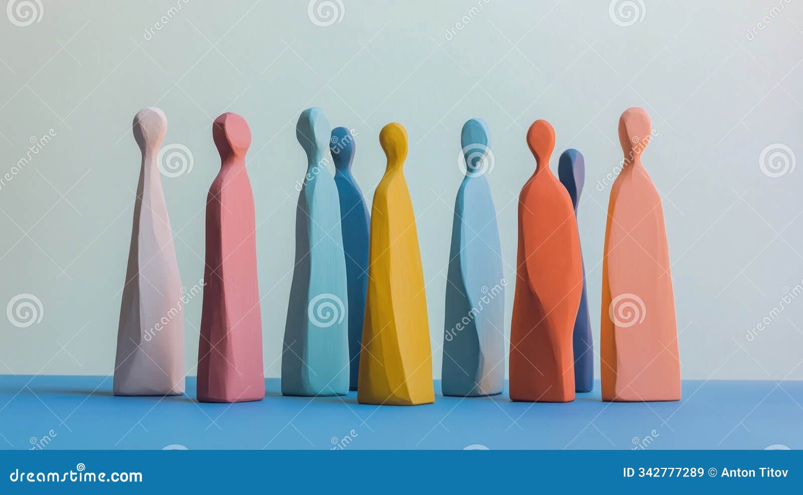 Colorful Clay Silhouettes on a Blue Tabletop Create a Striking Display ...