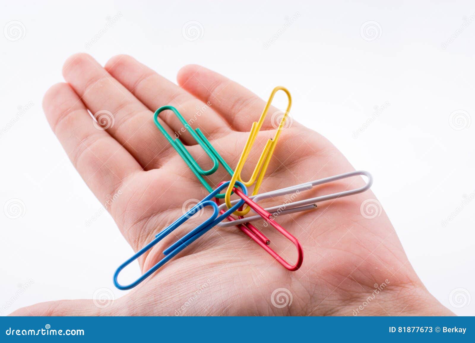Colorful Clips Placed in a Hand Stock Image - Image of clips, office ...