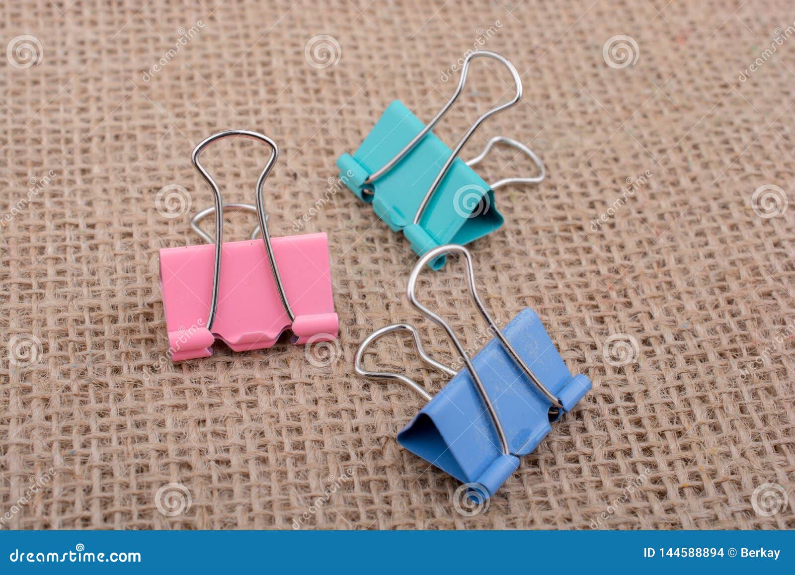 Colorful Clips Placed on Linen Canvas Stock Photo - Image of fastener ...
