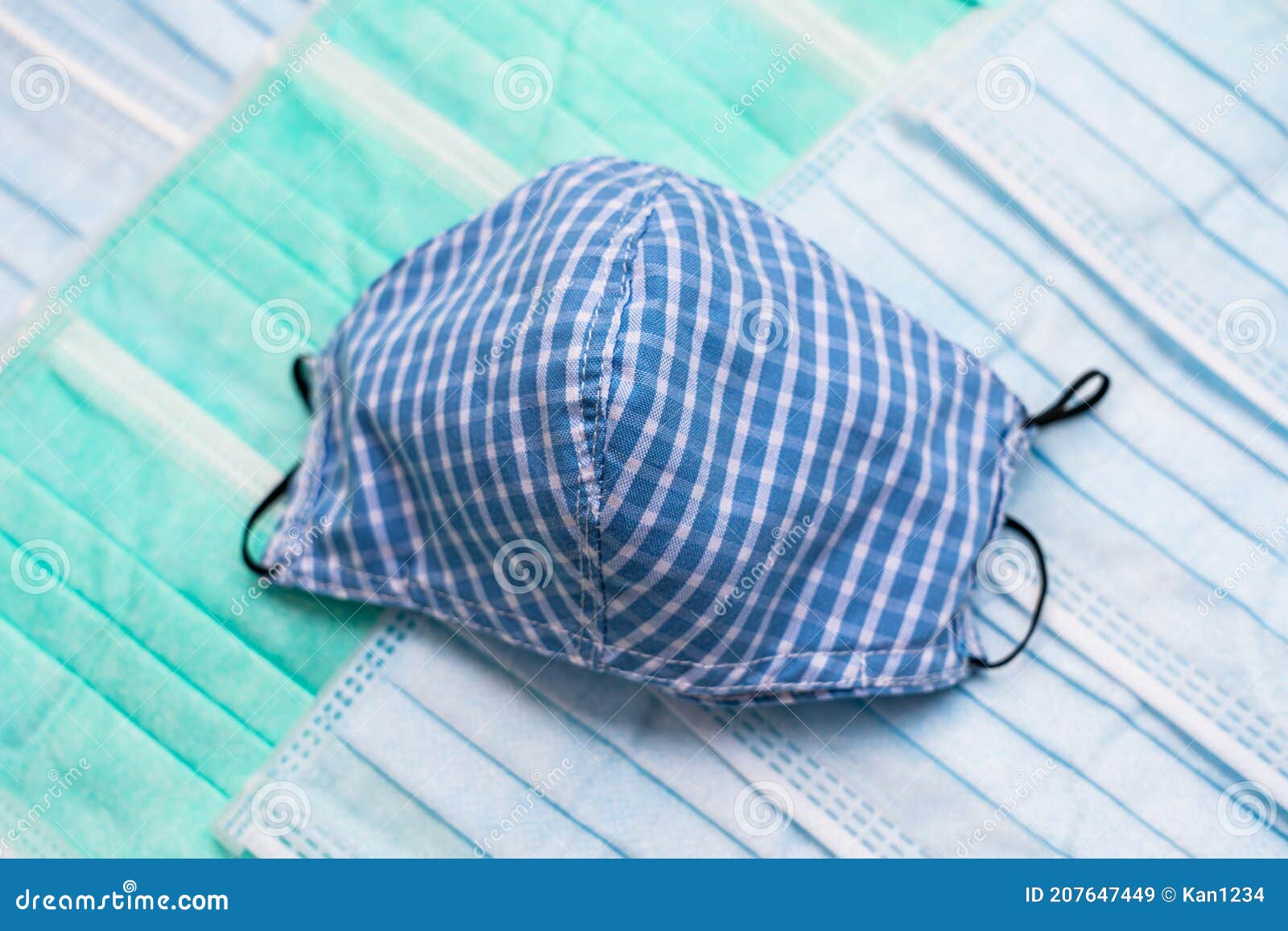 Colorful Cloth Face Mask on Surgical Mask Pattern Background Stock ...