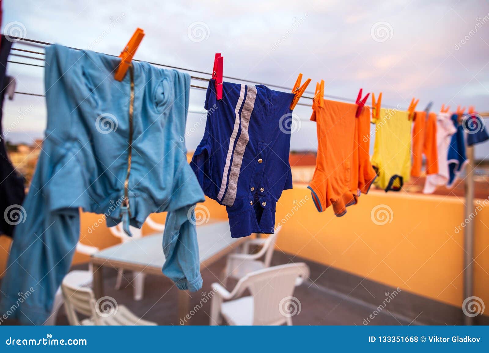 Colorful Clothes Hanging on Rope Stock Photo - Image of blue ...