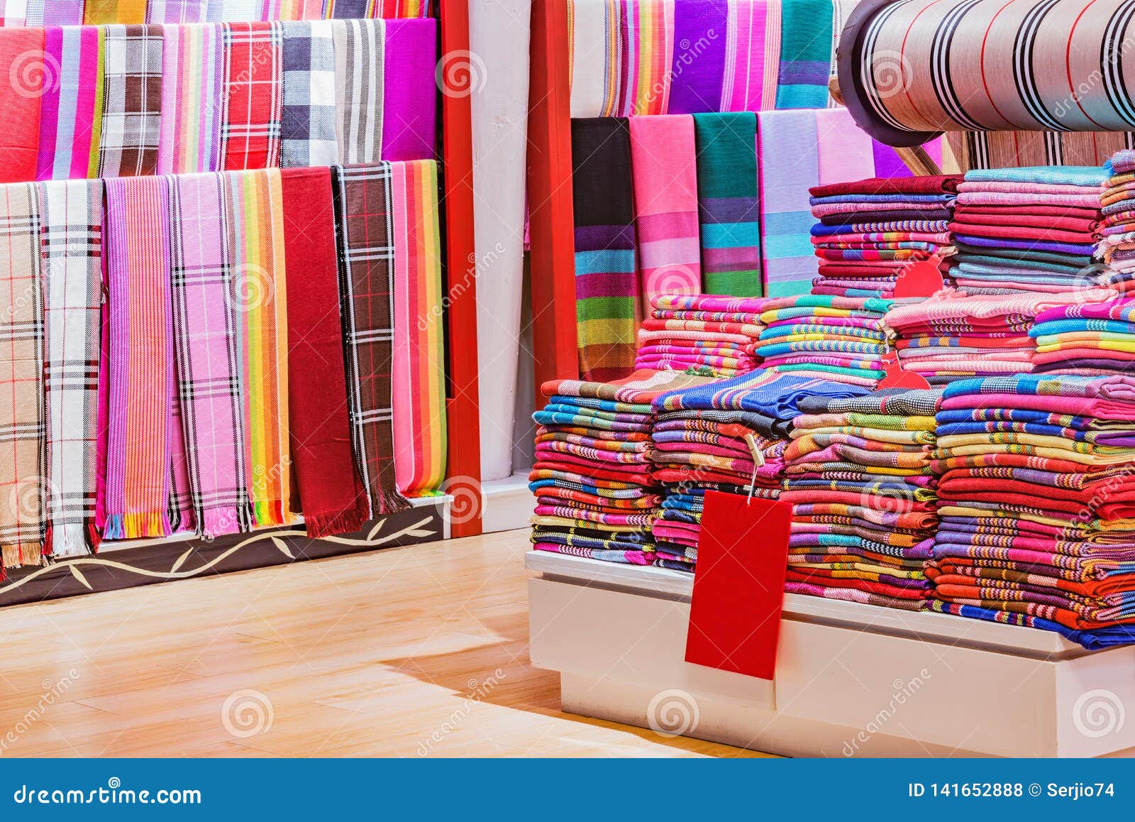 Colorful Clothes on the Shelves. Stock Photo - Image of elegant, offer ...