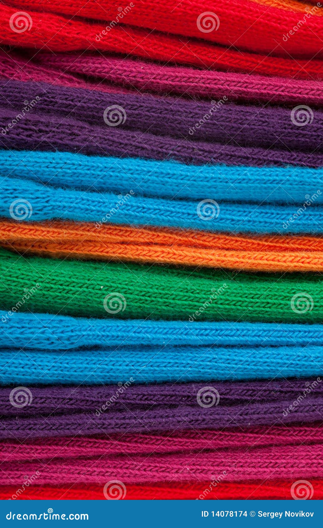 Colorful Clothes in a Stack Stock Photo - Image of warm, clothes: 14078174