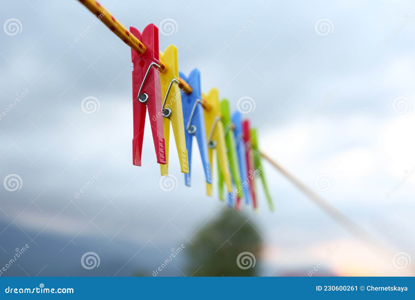Colorful Clothespins Hanging on Washing Line Outdoors Stock Image ...