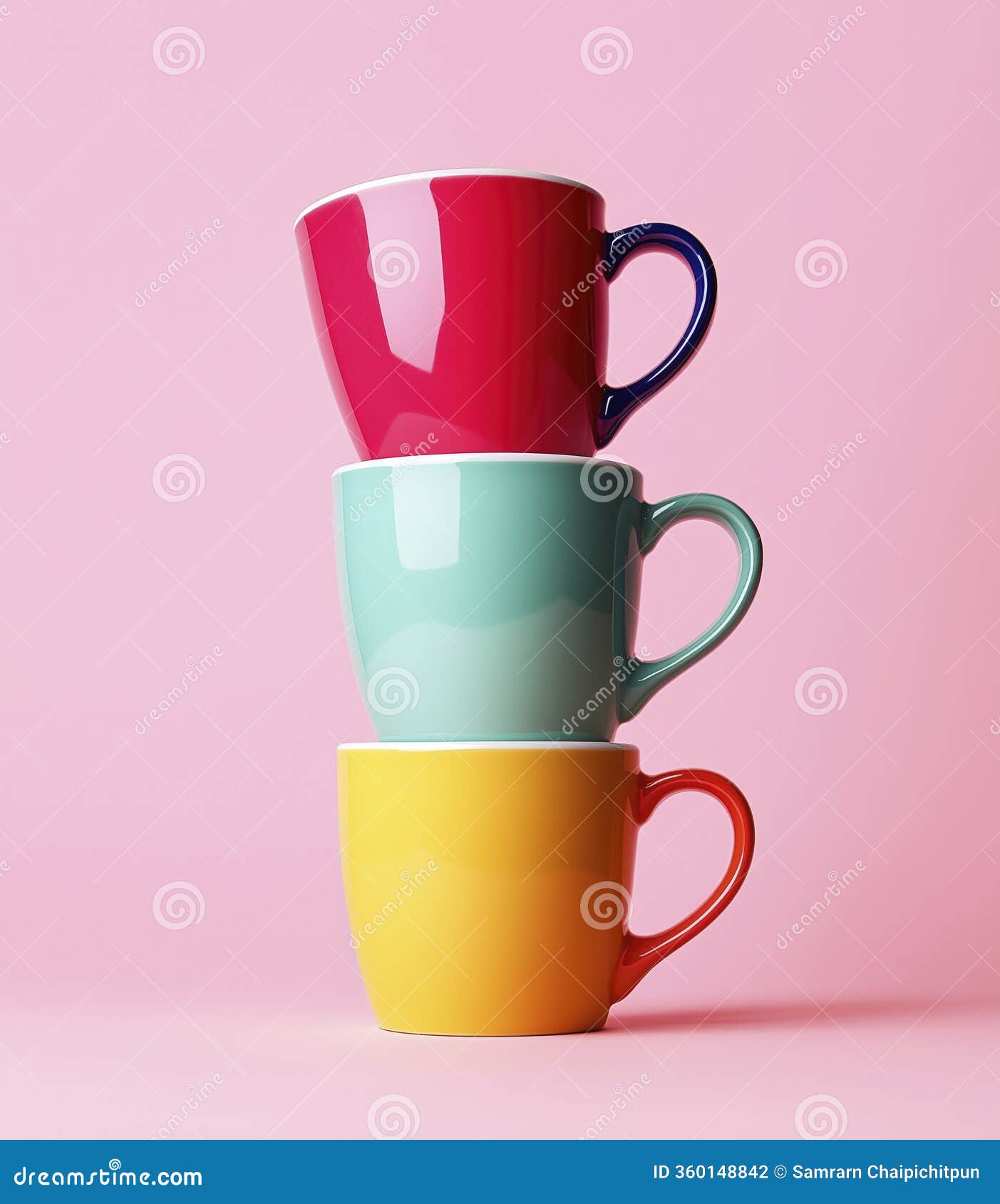 Colorful Coffee Mugs Stacked on Pink Background Create Cheerful ...