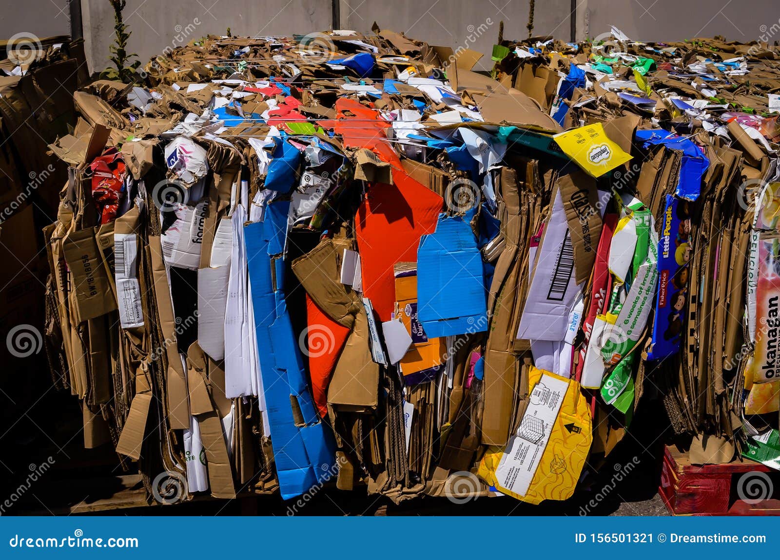 Colorful Collapsed Cardboard Boxes Baled for Recycling a Mundane Image ...