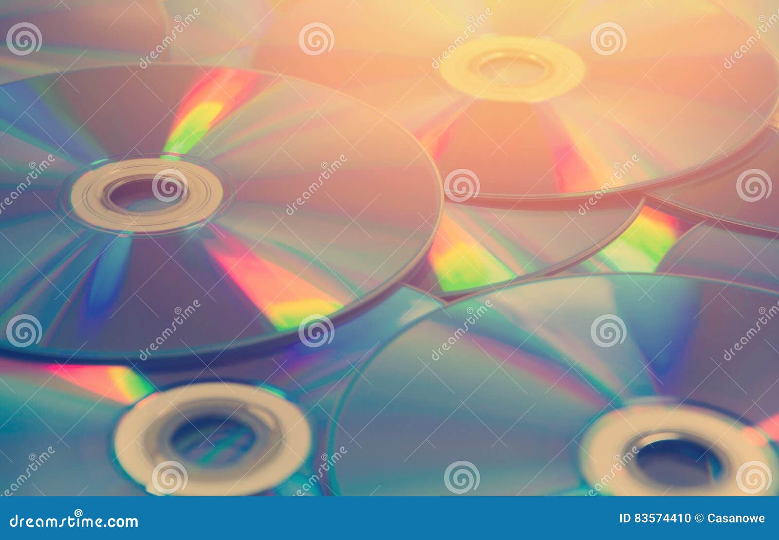 Colorful Compact Discs Set of DVD Scattered on a Table Stock Photo ...