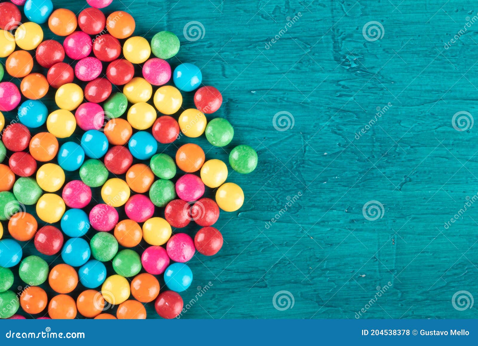Colorful Confetti Candy with Blue Background Top View Stock Photo ...